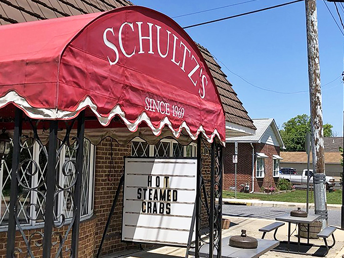 The iconic red awning of Schultz's has been beckoning seafood lovers since 1969. Like a lighthouse for the hungry, it promises maritime treasures within.