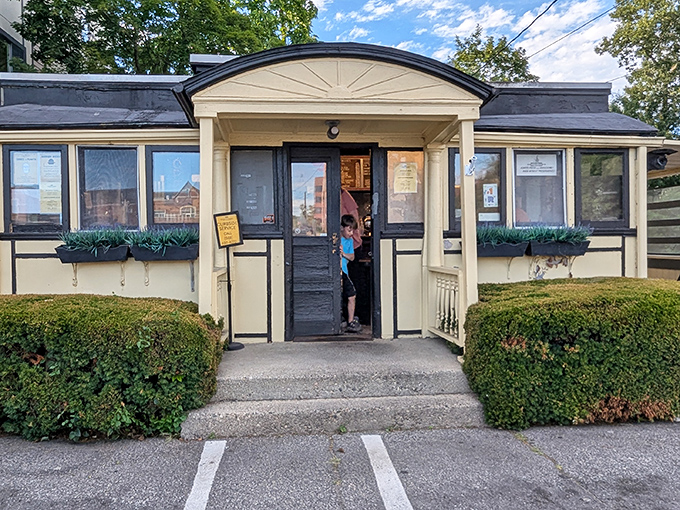 Casey's Diner stands proudly in Natick, its cheerful yellow exterior and curved roof a beacon for hungry travelers seeking authentic New England comfort food.