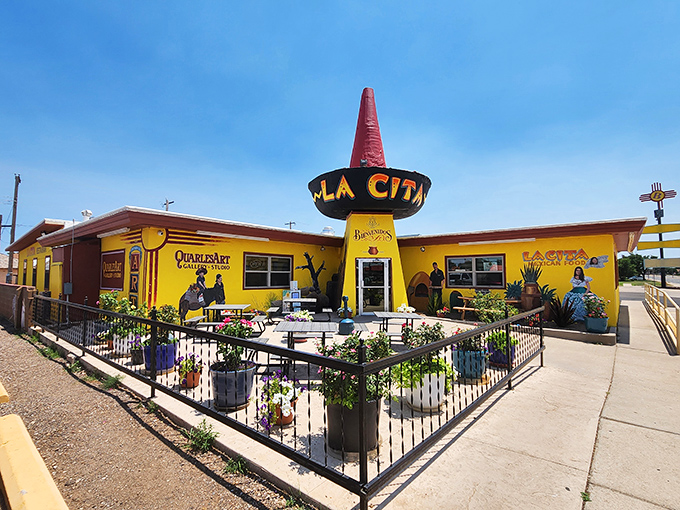 A peaceful patio area with potted plants offers diners a chance to enjoy New Mexico's famous blue skies while savoring those legendary enchiladas.