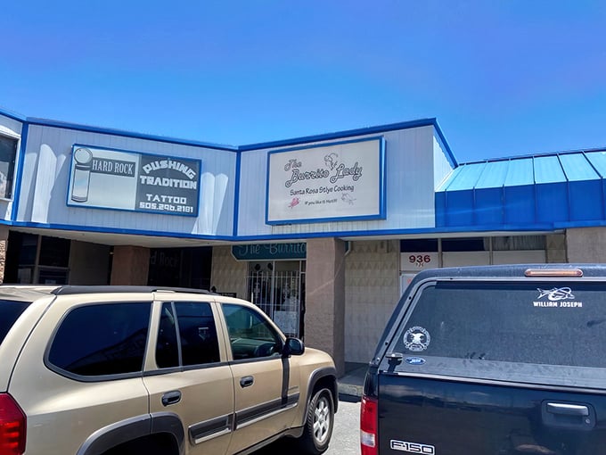 Blue trim frames this unassuming culinary landmark. Nestled between everyday businesses, it's where Albuquerque's breakfast dreams come wrapped in tortillas.