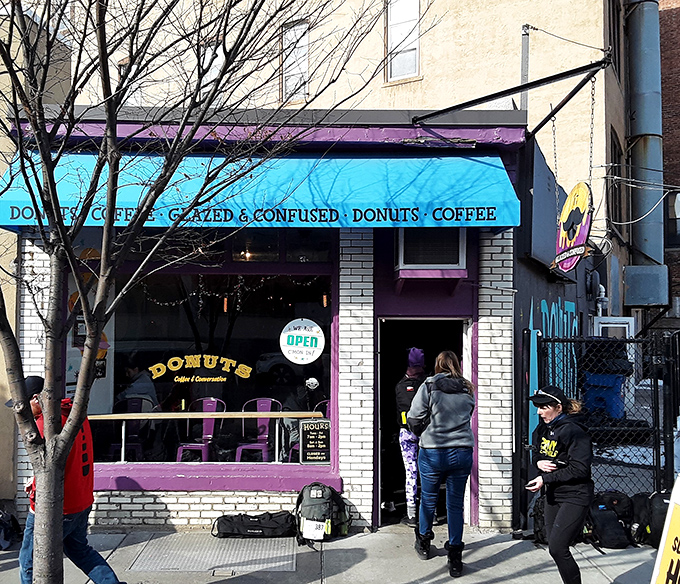 The turquoise awning and purple trim announce this donut sanctuary like a beacon of sweetness in Syracuse. Small in size, enormous in flavor impact.