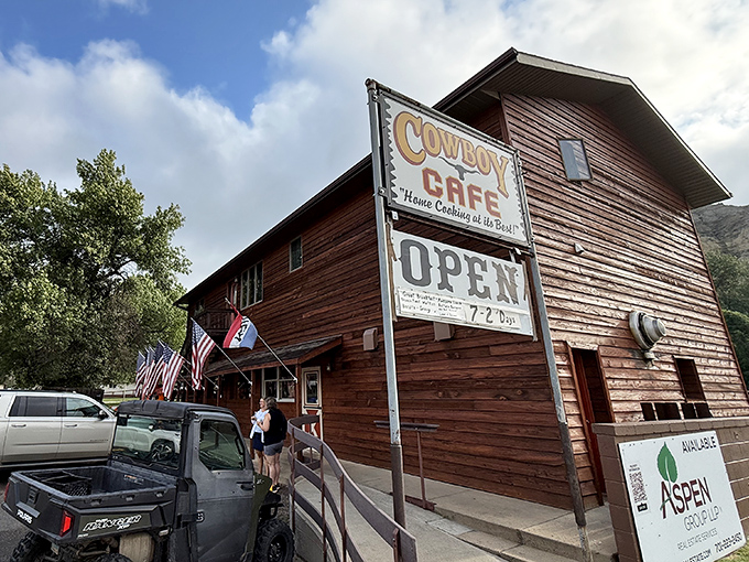 Where rustic charm meets culinary comfort &ndash; the Cowboy Cafe's weathered exterior and iconic sign have welcomed hungry adventurers for generations of North Dakota mornings.