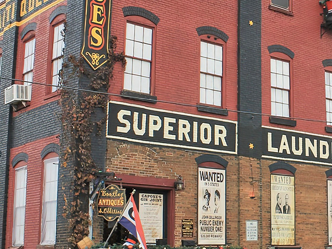 The "WANTED" posters and vintage signage create a playful outlaw vibe—as if the real crime would be walking past this treasure trove without stopping to explore.