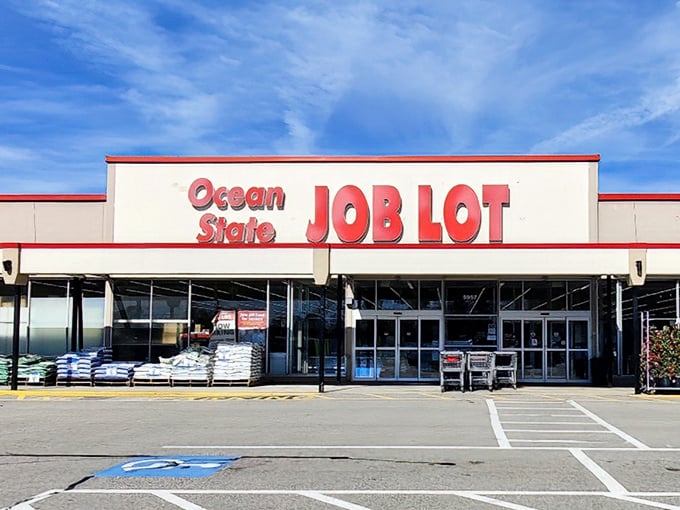 The iconic red and white fa&ccedil;ade of Ocean State Job Lot beckons bargain hunters like a retail lighthouse guiding ships to treasure-filled shores.