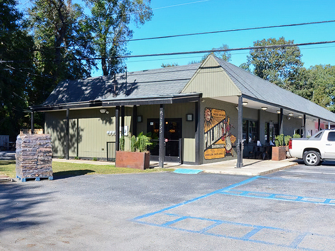 The unassuming exterior of Palmira Barbecue proves once again that the best BBQ joints don't need fancy facades—just follow your nose to smoky paradise.