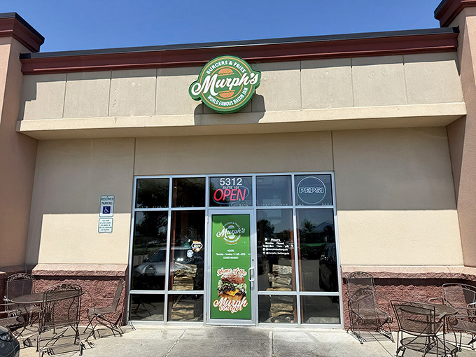That cheerful green sign and those outdoor tables are calling your name louder than a dinner bell.
