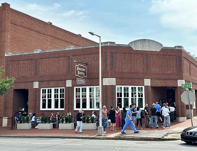The brick facade of Pancake Pantry stands like a breakfast beacon in Hillsboro Village, promising pancake perfection to those patient enough to wait.