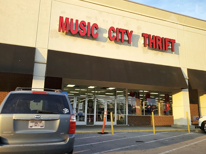 The bold red letters of Music City Thrift stand out against the Nashville sky like a beacon for bargain hunters with designer dreams.