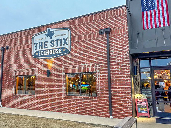 The red brick fortress of flavor announces itself with Texas pride and a promise of good times ahead.