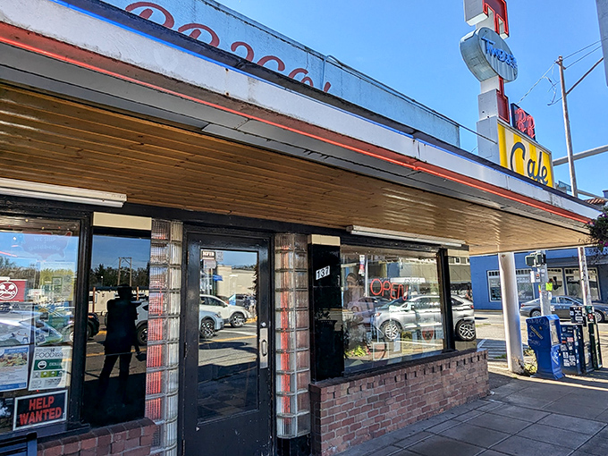 Twede's iconic storefront beckons with mid-century charm &ndash; those glass blocks and vintage signage promising a time-traveling culinary adventure beneath the Washington sky.