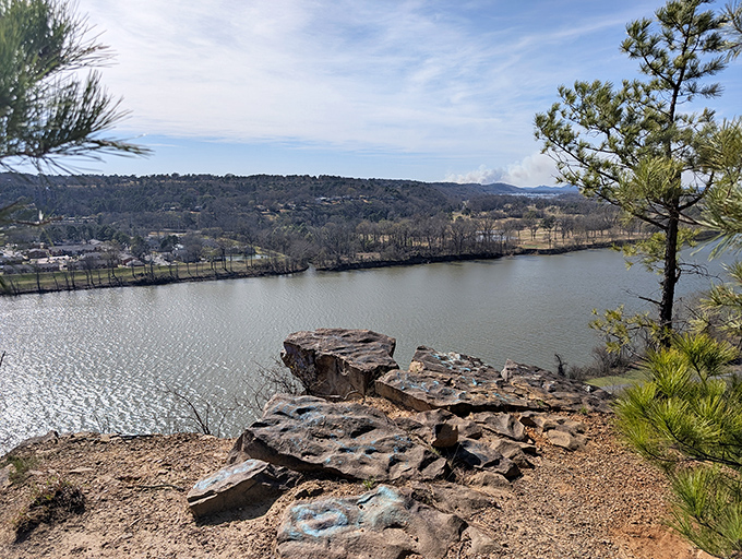 The view that launched a thousand gasps. Arkansas River stretches below dramatic bluffs, proving the Natural State earned its nickname honestly.