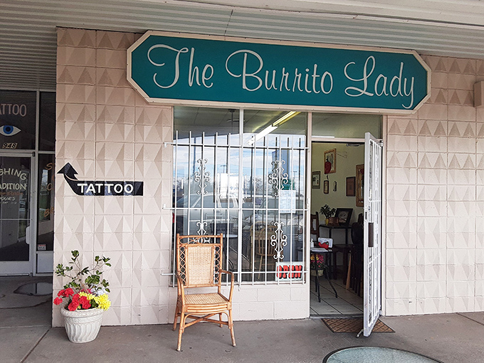 The turquoise sign beckons like a desert oasis. The Burrito Lady's modest storefront promises culinary treasures that locals have cherished for years.