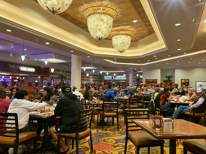Inside, the warm, inviting glow welcomes hungry diners, offering a comforting refuge from the surrounding slot machines and overpriced Strip restaurants.