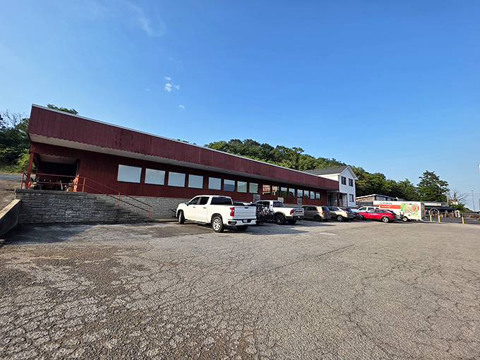 The unassuming red exterior of Watermill Restaurant stands like a beacon for hungry travelers, promising homestyle comfort without pretension.