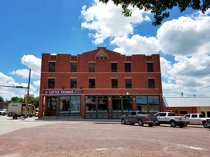 The historic brick fa&ccedil;ade of The Cattle Exchange stands proudly on Canadian's main street, a beacon for hungry travelers seeking authentic Texas flavor.