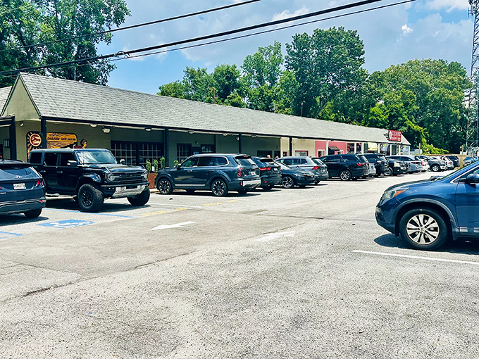 A full parking lot tells the real story &ndash; when locals willingly wait for lunch on a beautiful day, you know the barbecue justifies the patience.
