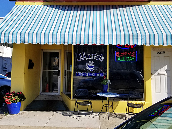Sidewalk seating for the optimists who believe in Atlantic City's perfect weather days. That neon "BREAKFAST ALL DAY" sign is speaking my love language.