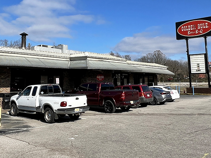 That classic red sign isn't just advertising&mdash;it's a beacon calling hungry souls home to barbecue paradise since way back when.