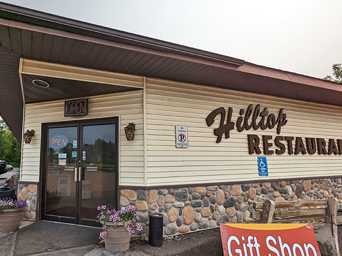 The unassuming exterior of Hilltop Restaurant hides culinary treasures within, like finding a diamond in Michigan's Upper Peninsula rough.