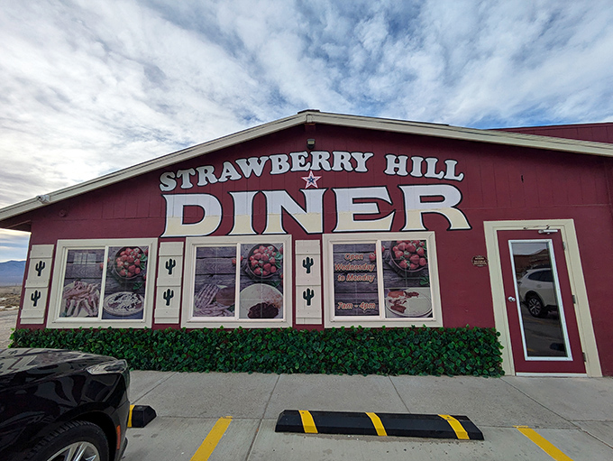Under Nevada's impossibly blue sky, Strawberry Hill Diner's bold signage makes a promise that its kitchen fully intends to keep – comfort food worth the journey.