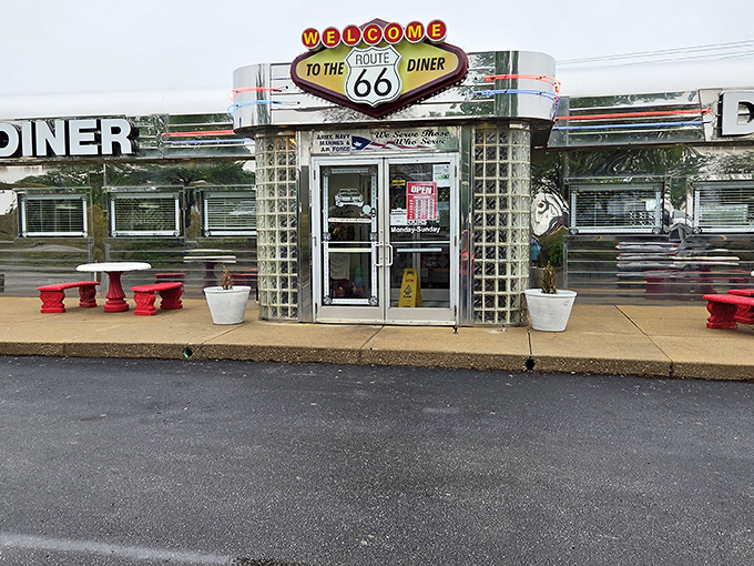 Chrome so bright you might need sunglasses! The Route 66 Diner's gleaming exterior promises a time-traveling feast for both eyes and stomach.