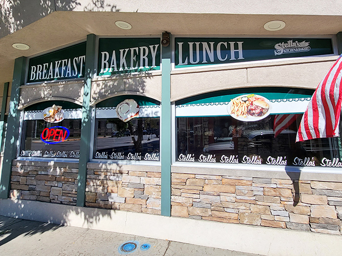 The storefront announces its priorities with unmistakable clarity: BREAKFAST, BAKERY, LUNCH. Like a delicious haiku of what matters most in life.