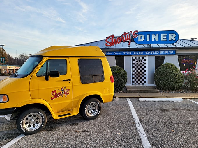 That bright yellow van isn't just eye-catching&mdash;it's a beacon of breakfast hope parked outside the checkered paradise that is Shorty's Diner.
