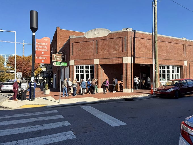 The brick facade of Pancake Pantry stands like a breakfast beacon in Hillsboro Village, promising pancake perfection to those patient enough to wait.