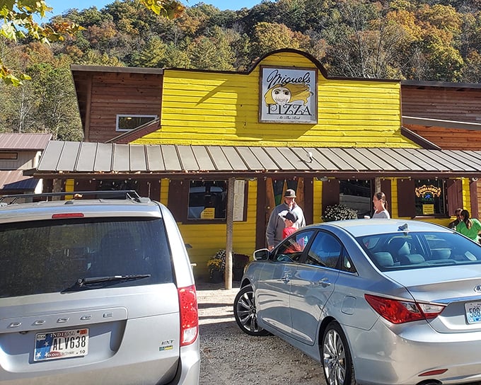 That sunshine-yellow exterior isn't just a building&mdash;it's a beacon of hope for hungry hikers and climbers seeking pizza salvation in the Kentucky wilderness.