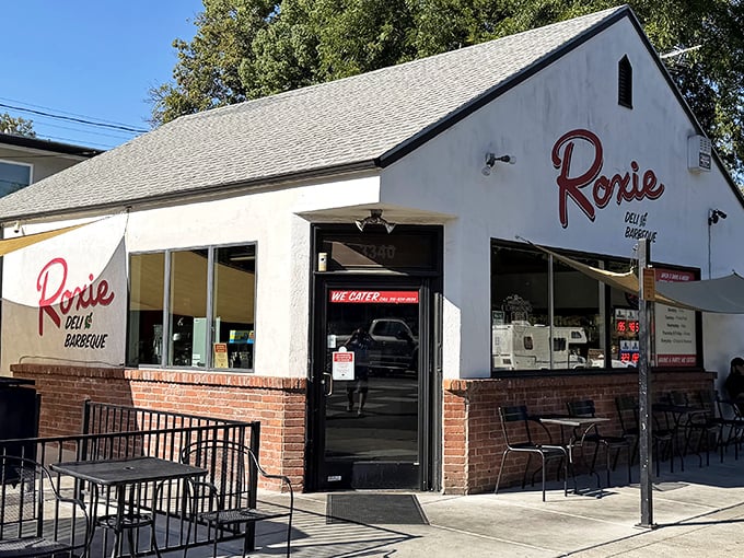 The unassuming white building with red script signage doesn't scream "food destination," but locals know better. Sacramento's best-kept secret hides in plain sight.