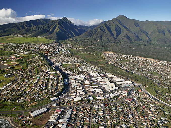 Kahului sprawls beneath Maui's majestic mountains, a working town with more authentic character than your average tourist brochure promises.