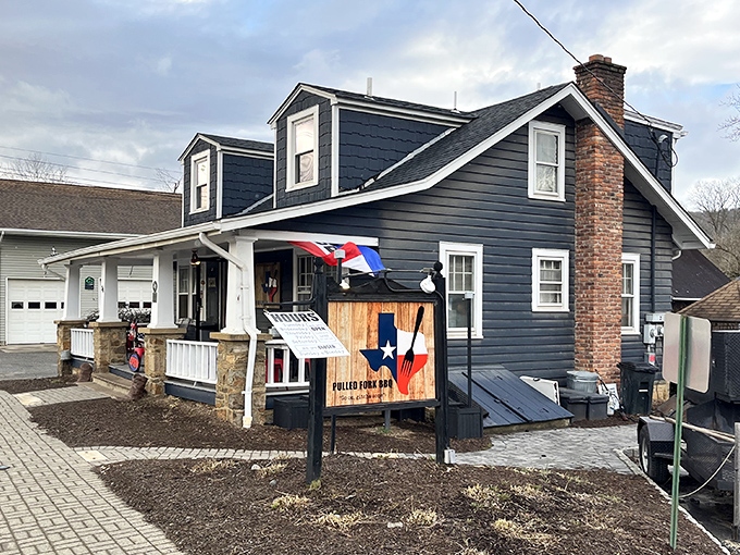 The unassuming blue house with its Texas-flag sign doesn't scream for attention&mdash;it whispers instead, confident that great barbecue needs no neon introduction.