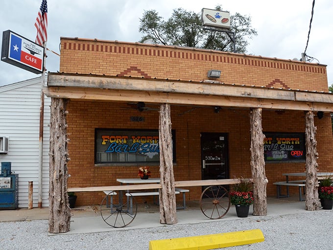 A view of Fort Worth's welcoming exterior, where the Texas state flag sign promises authentic flavors that'll transport you straight to the Lone Star State.