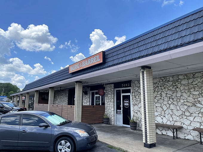 The unassuming stone facade of Burg & Barrel hides culinary treasures within, like a delicious secret waiting to be discovered in Overland Park.