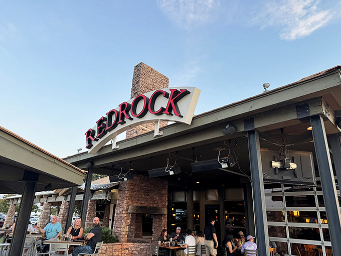 The bold red signage against blue skies announces what locals already know&mdash;you've arrived somewhere special.