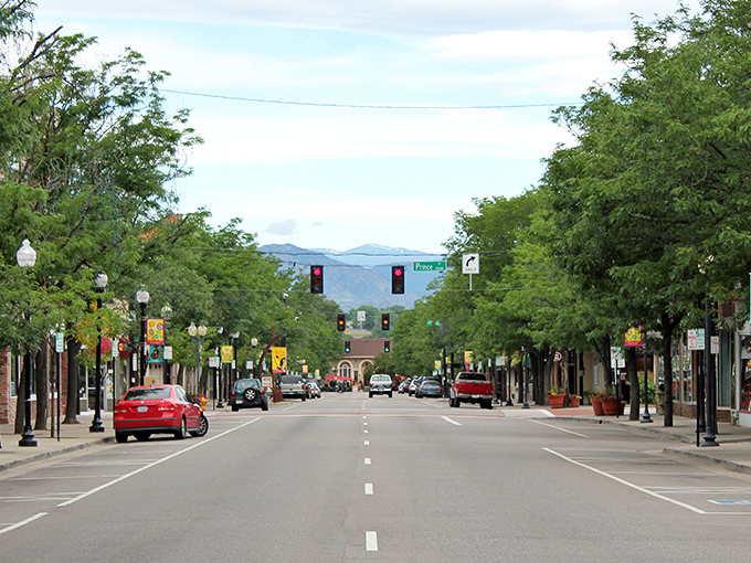 Littleton's tree-lined Main Street offers small-town charm with mountain views, embodying the affordable Colorado lifestyle retirees dream about.