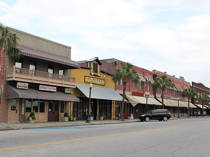 The historic district's storefronts offer a rainbow of architectural personalities, each building telling its own story while collectively creating a downtown straight from a Hallmark movie set.