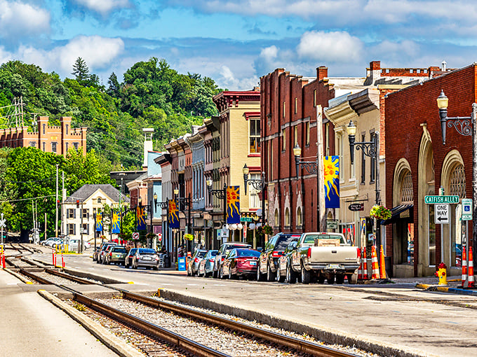 Downtown Frankfort's historic charm unfolds like a storybook, where brick buildings and colorful banners create a Main Street that Norman Rockwell would have loved to paint.