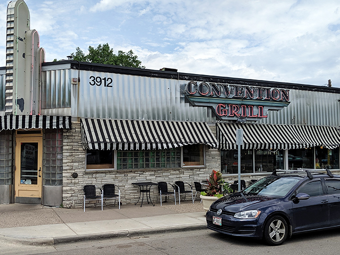 The classic American diner dream stands proudly on France Avenue, its striped awnings and neon signage beckoning hungry travelers like a lighthouse for comfort food enthusiasts.