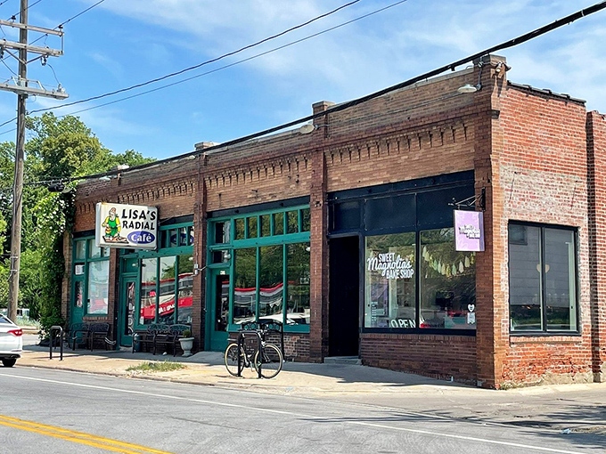 The brick facade and green-trimmed windows of Lisa's Radial Cafe stand as a beacon of breakfast hope on this Omaha corner.