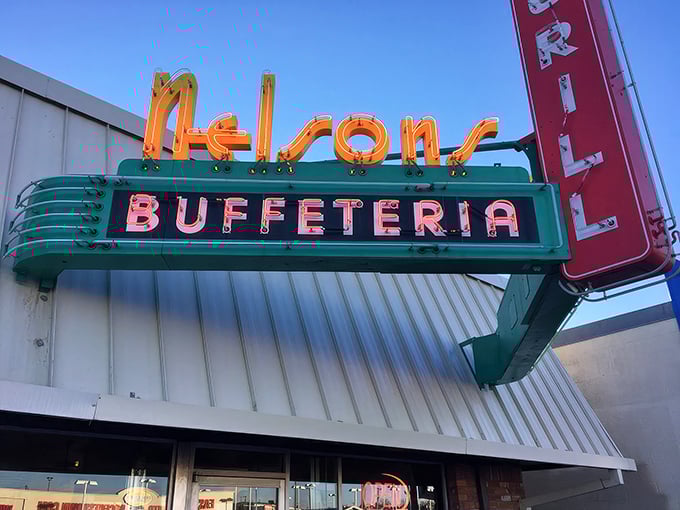 That iconic orange and teal signage isn't just restaurant branding &ndash; it's a time portal to when diners served community alongside comfort food.