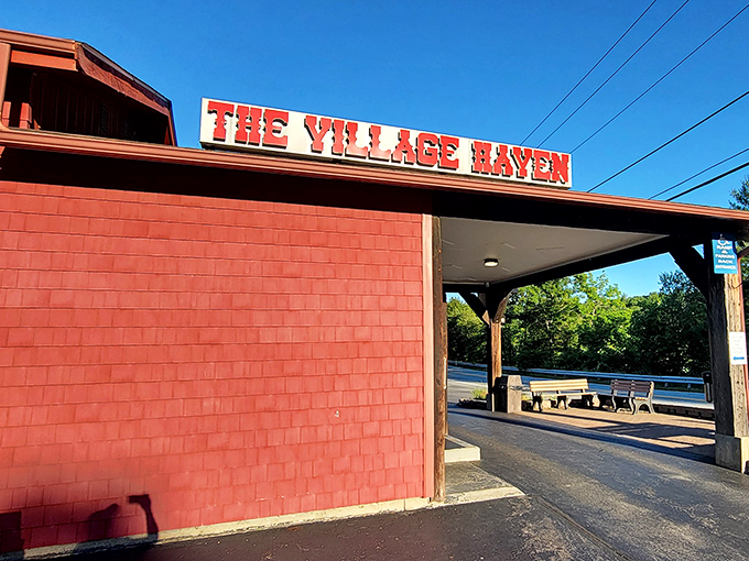 The iconic red exterior of The Village Haven stands like a beacon of comfort food promise in Forestdale. Some buildings just scream "good eating inside!"