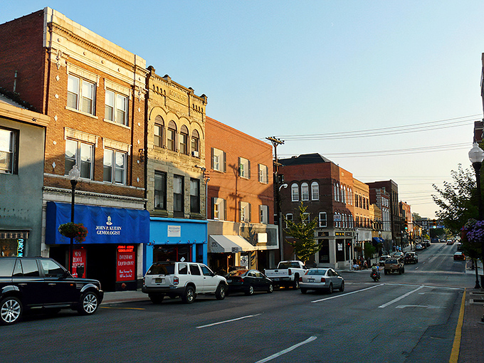 Historic charm meets college-town energy on High Street, where Morgantown's sandstone buildings stand as monuments to both preservation and progress.