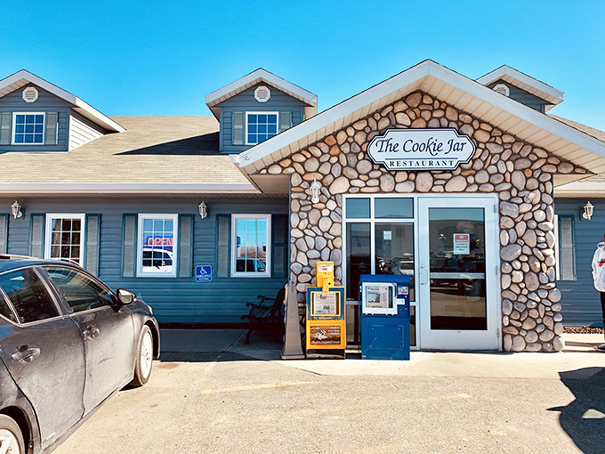 Blue skies frame this Alaskan comfort food haven, where the stone entrance promises warmth inside regardless of the thermometer's reading outside.