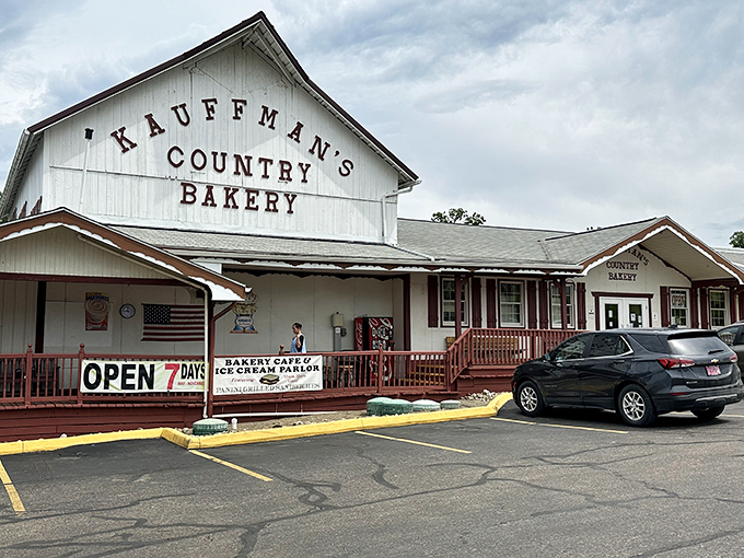 The white barn-inspired facade of Kauffman's stands like a beacon of baked goodness, promising carb-loaded treasures that make diets weep with jealousy.