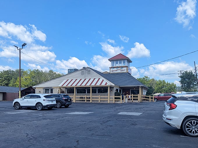 The lighthouse-topped exterior of Smuggler's Cove stands like a beacon for hungry travelers in Tannersville. Nautical charm in the mountains? Absolutely.