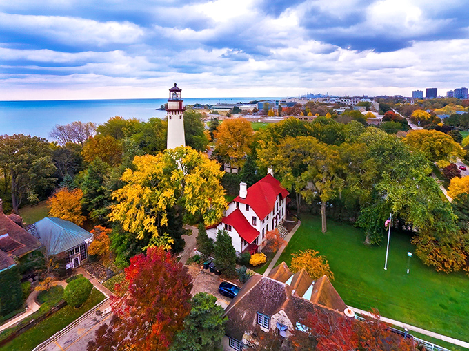 Autumn transforms Grosse Point Lighthouse into a painting come to life, where fall foliage frames this maritime sentinel watching over Lake Michigan's azure waters.