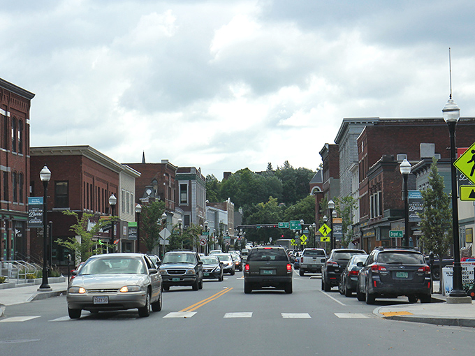 Main Street pulses with small-town energy as locals navigate the heart of Barre, where everybody knows your name.