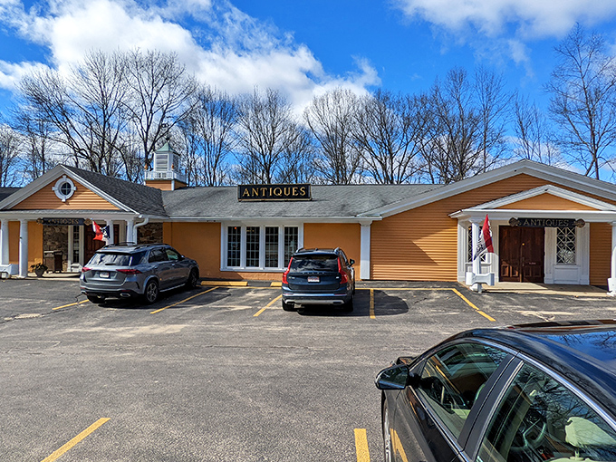 Sturbridge Antique Shops in winter reveals bare trees and the same charming colonial-inspired architecture that houses countless historical treasures year-round.