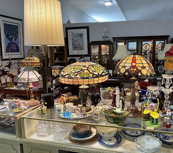 Tiffany-style lamps create a kaleidoscope of color above treasures waiting to be discovered. Like a stained-glass sunset for your living room.